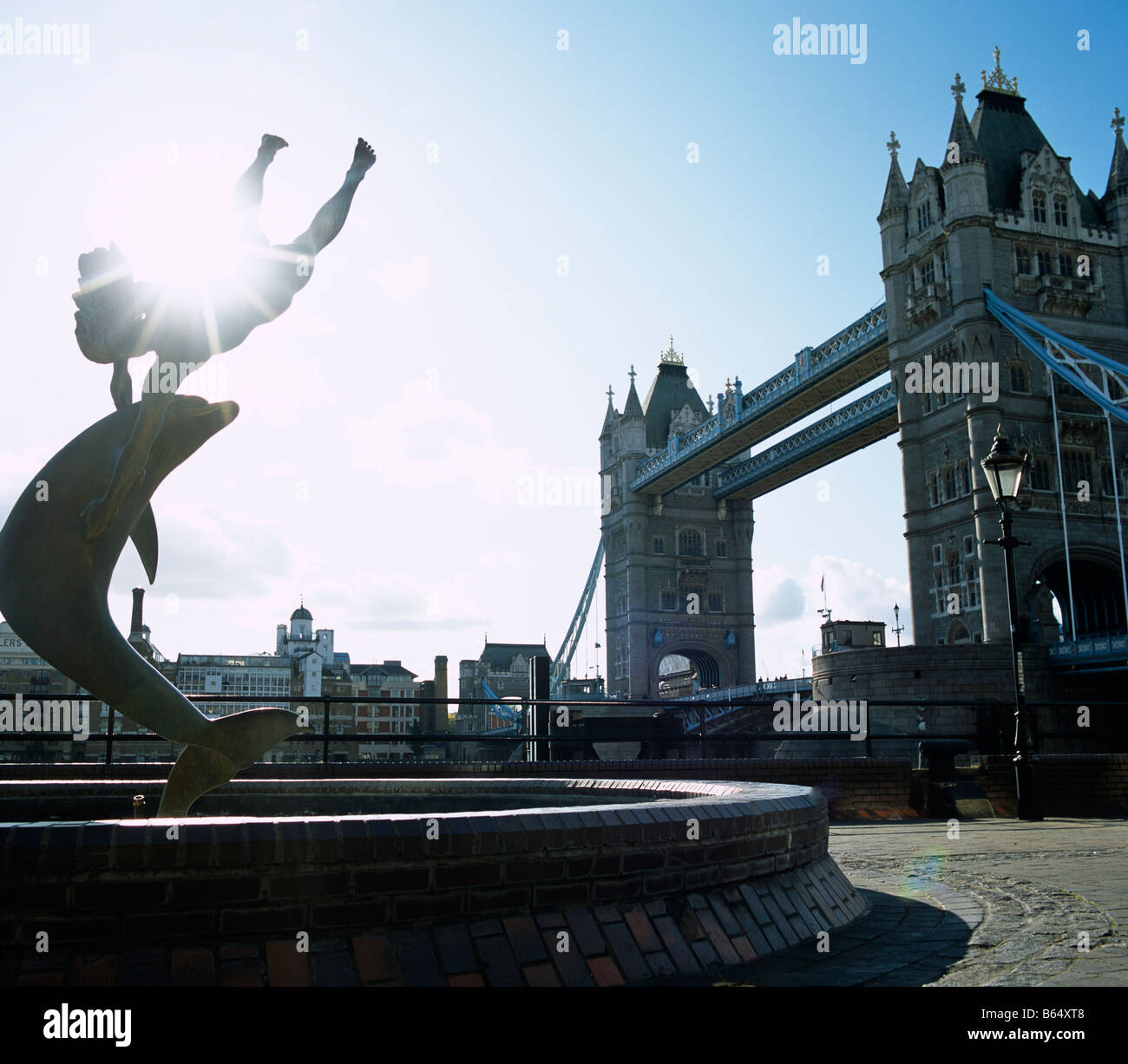 Tower Bridge And Dolphin Statue London UK Europe Stock Photo - Alamy