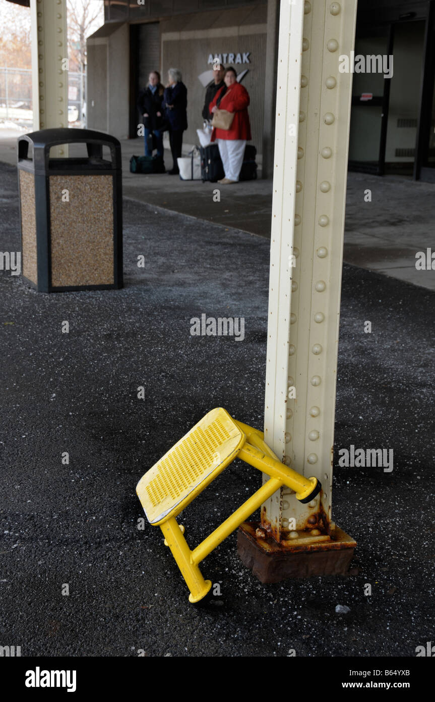 Yellow step stool at train station Stock Photo - Alamy