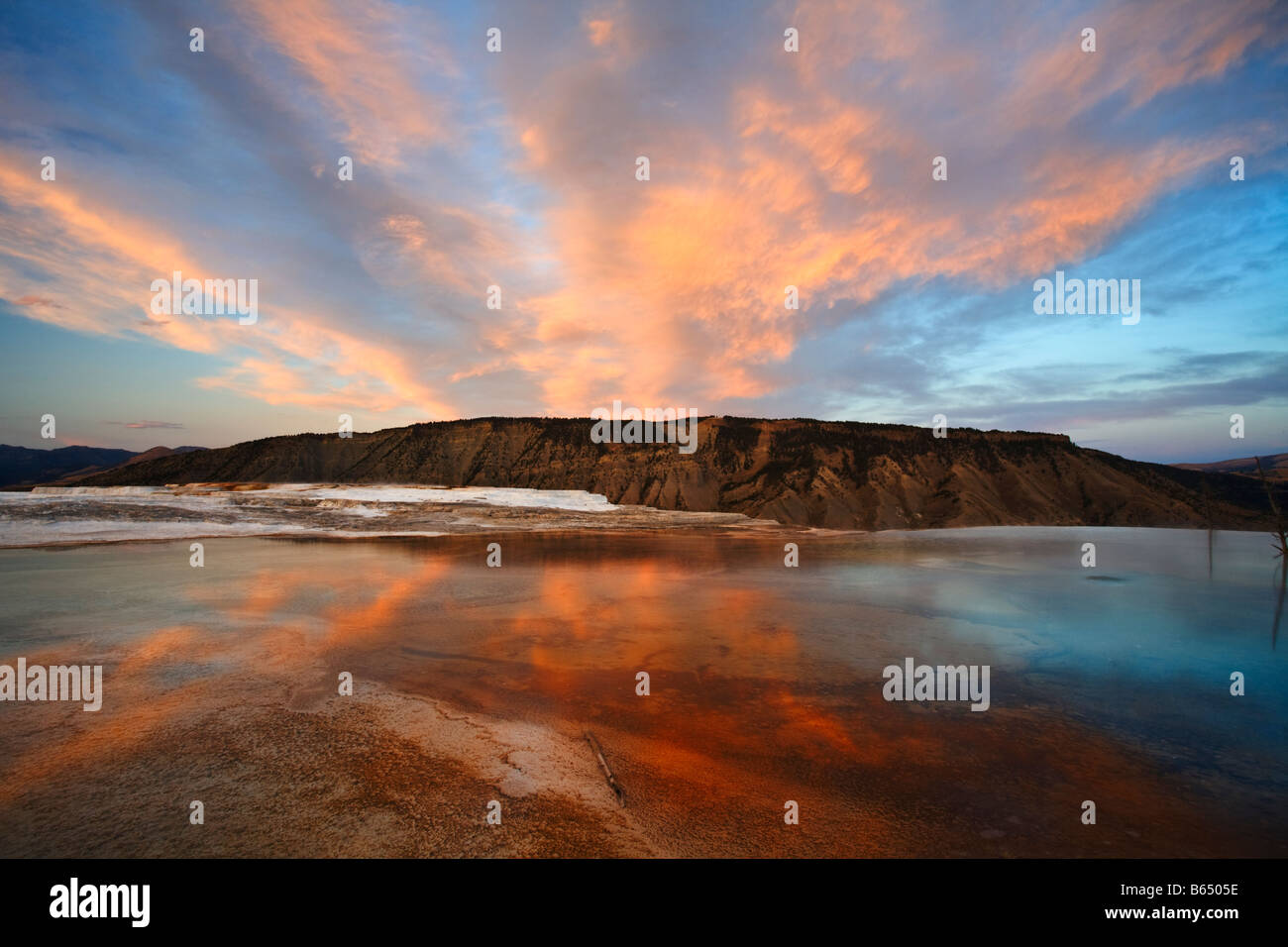 Yellowstone National Park WY: Colors of evening sky reflected on the ...