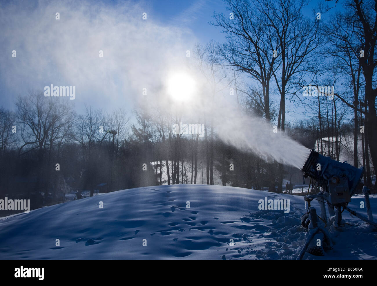 Snow gun making snow Stock Photo - Alamy