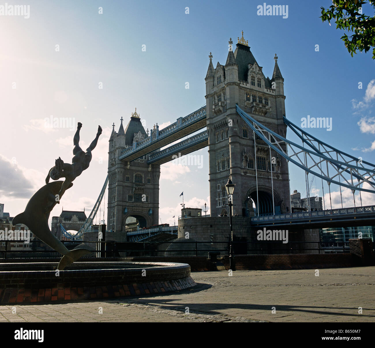Tower Bridge And Dolphin Statue London UK Europe Stock Photo - Alamy
