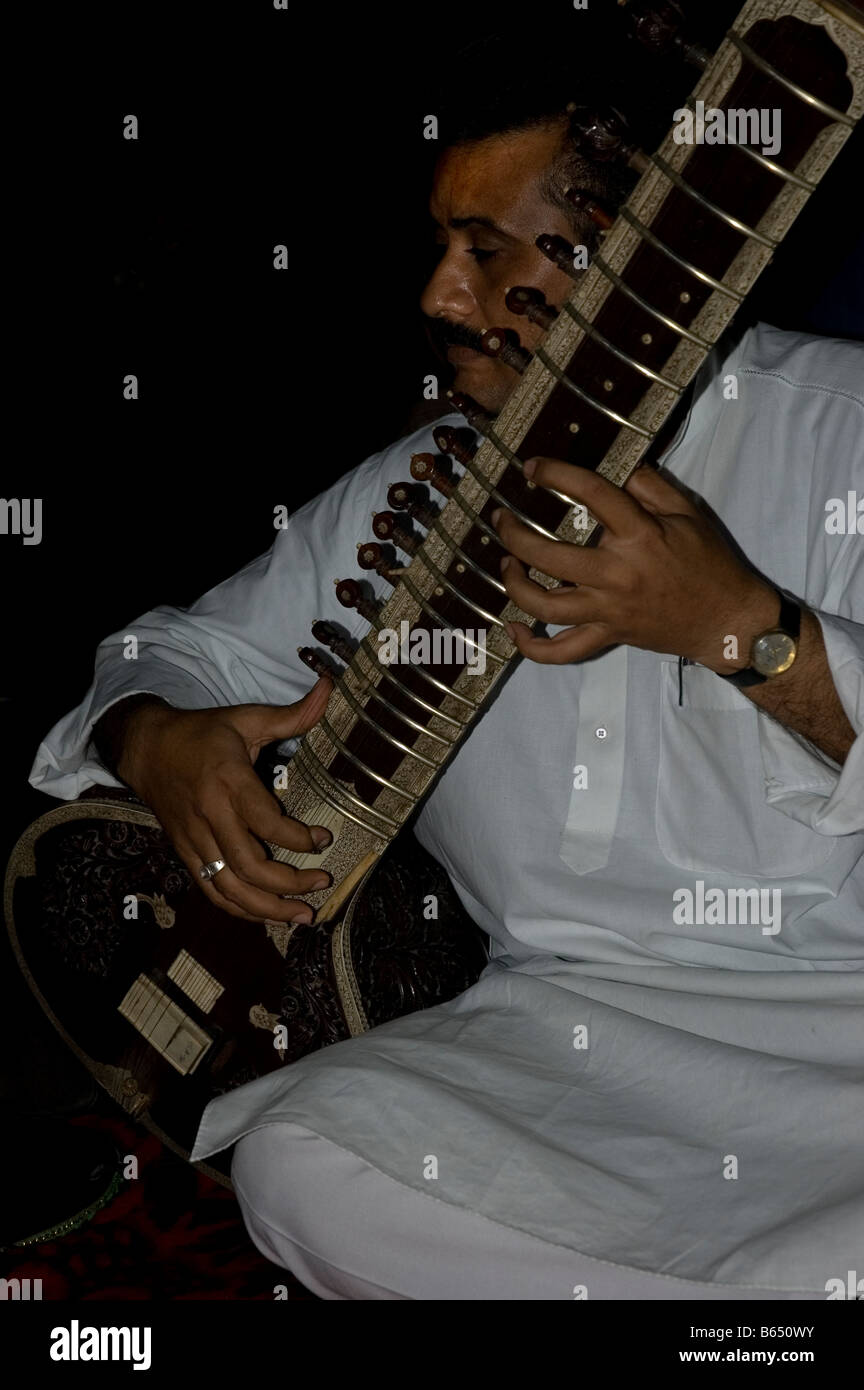 Close up photo of a musician playing the sitar in Varanasi India Stock ...