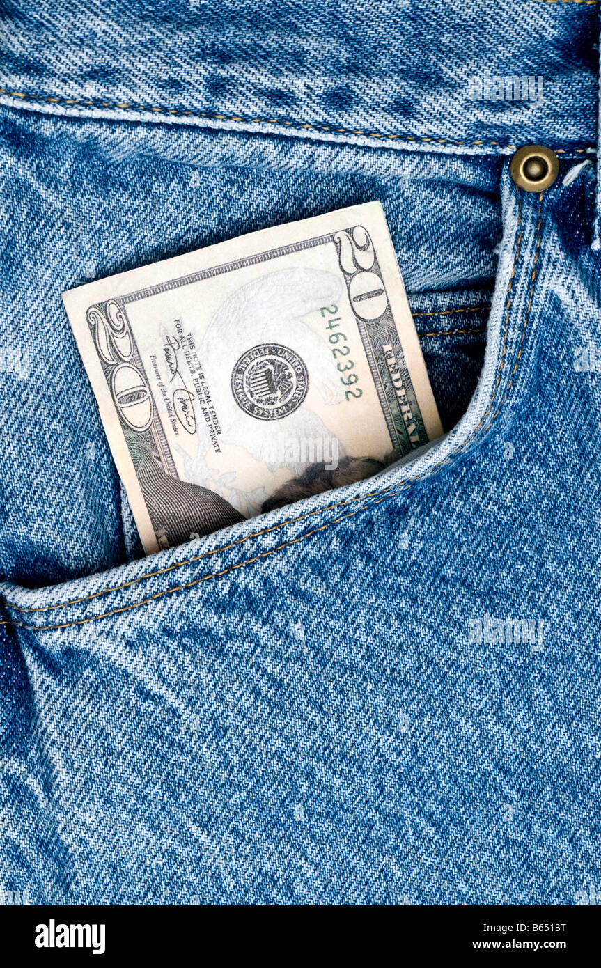 A closeup of money in blue jeans pocket Stock Photo - Alamy