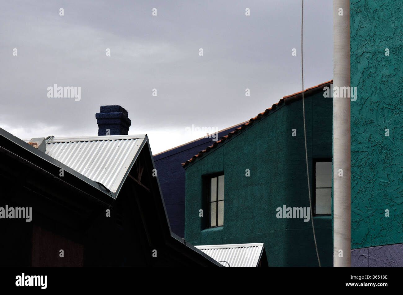 Converging roofs from colorful buildings under an overcast sky Stock ...
