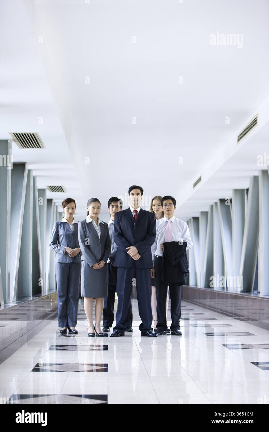 Business people standing in the office building Stock Photo - Alamy