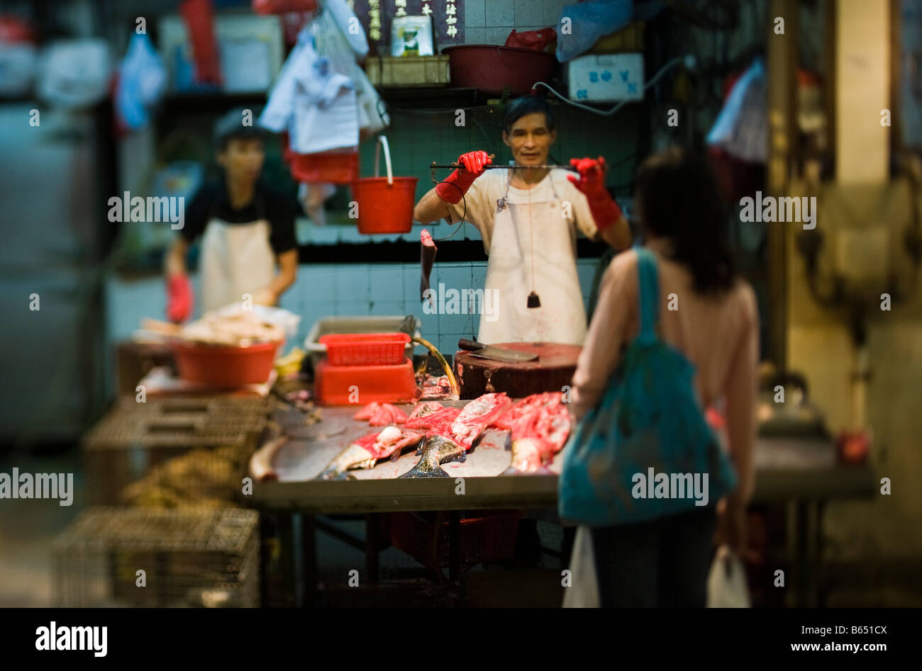 Early morning activity in a chinese butchery in the Wanchai district of ...