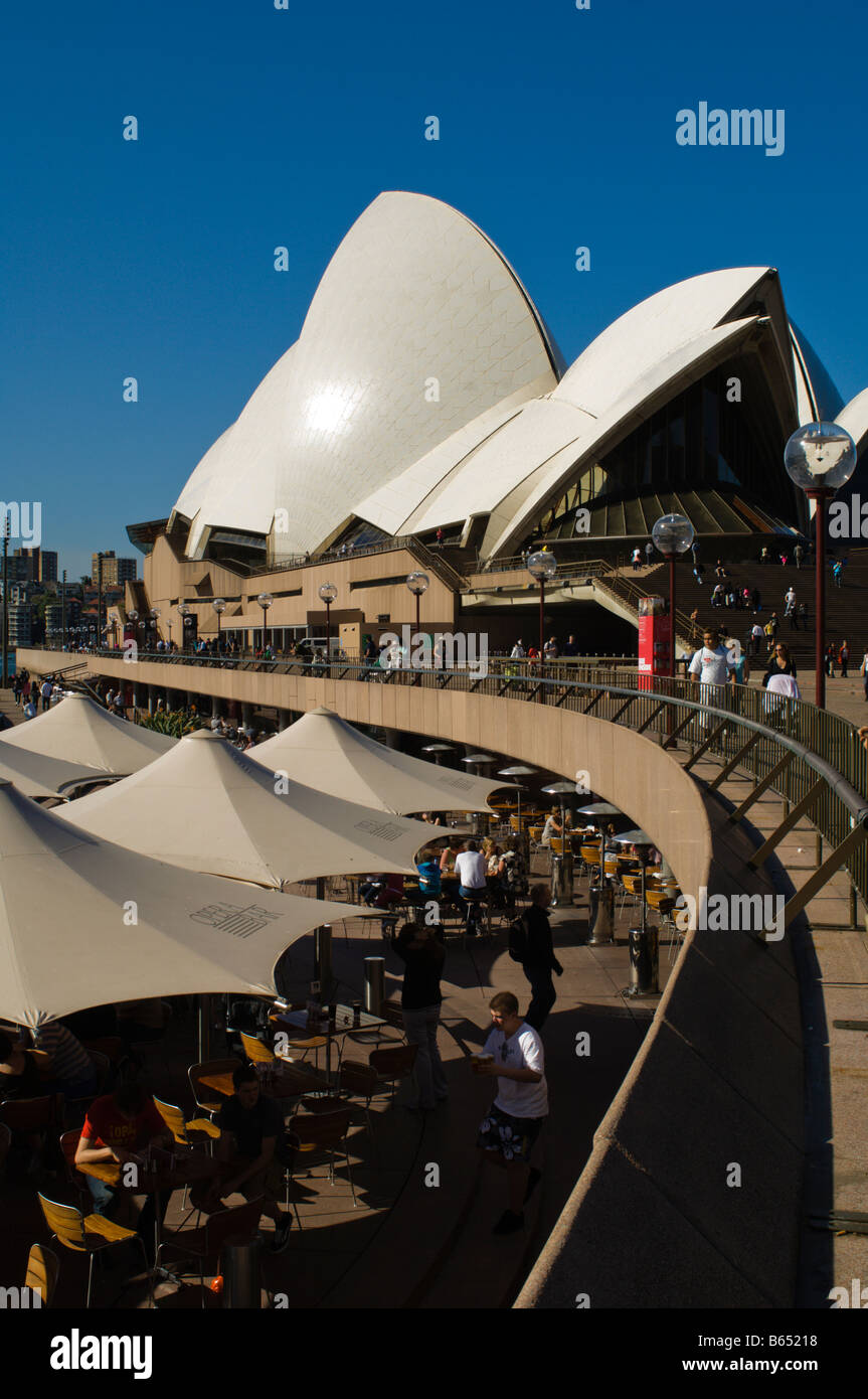 Sydney harbour restaurants and the Opera House Stock Photo - Alamy