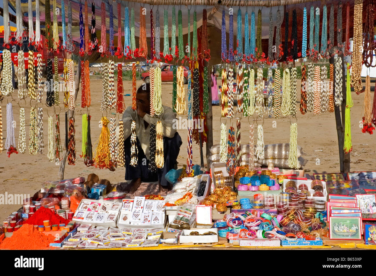Trinket stall on the banks of the Ganges River at the sangam at ...