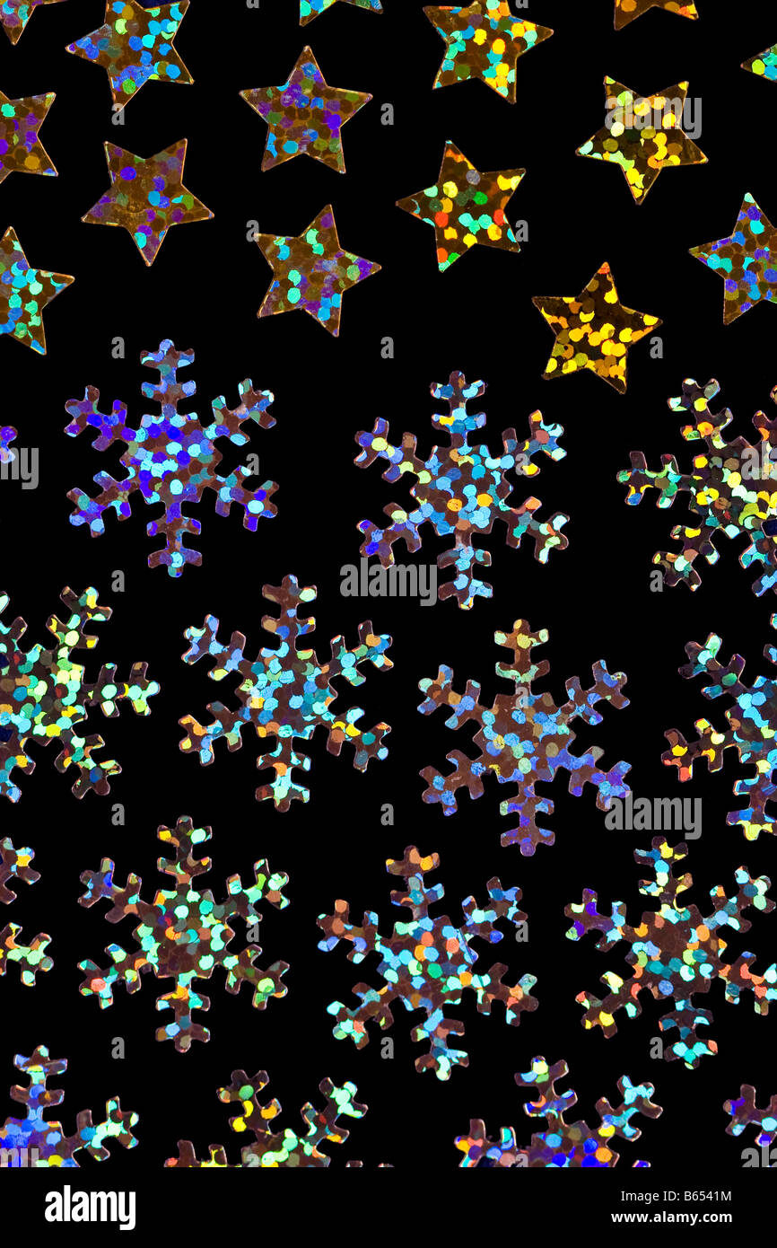 Multi Coloured Stars and Snowflakes Against a Black Background Stock ...