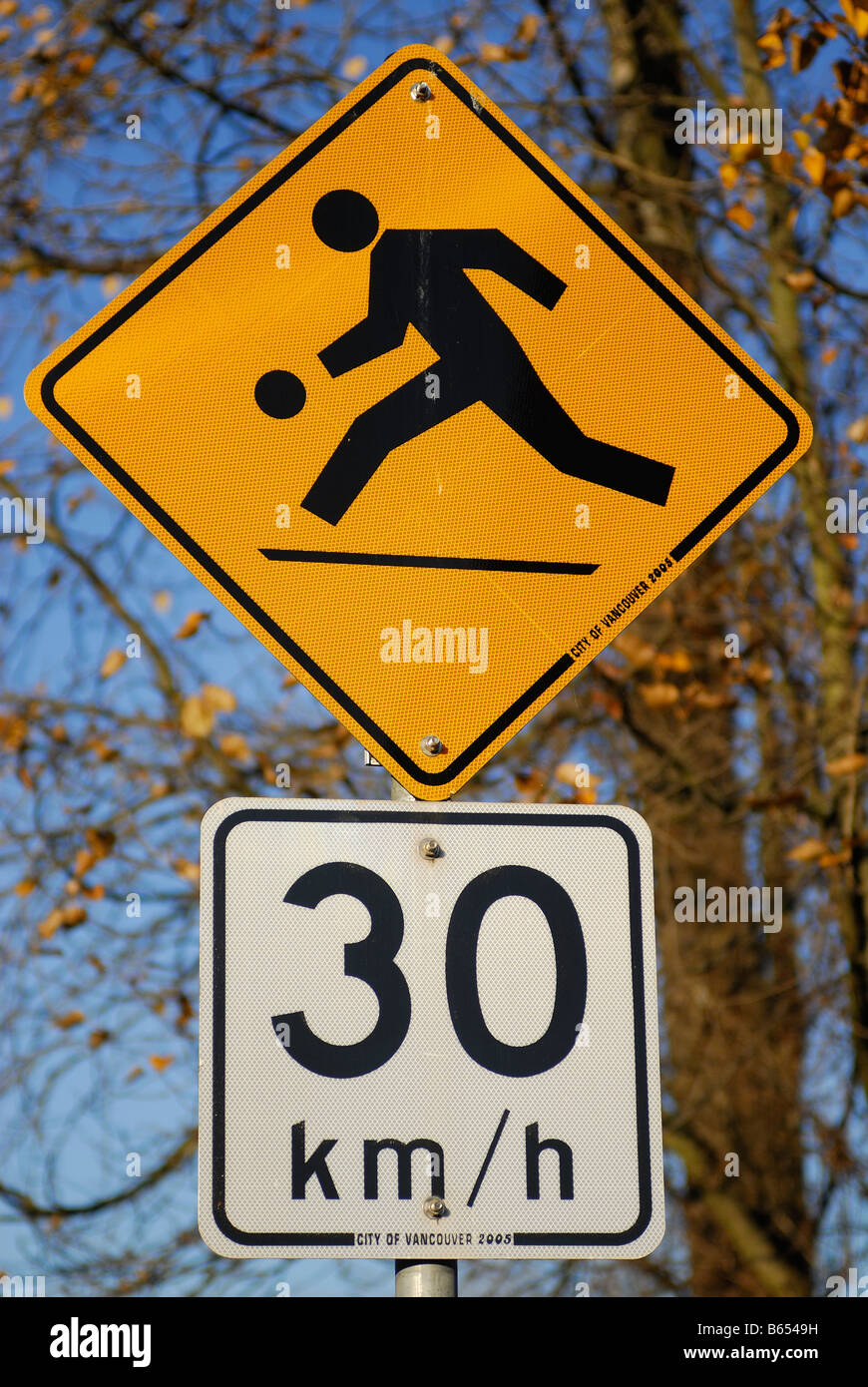 yellow and white traffic panel pedestrian crossing and speed limit ...