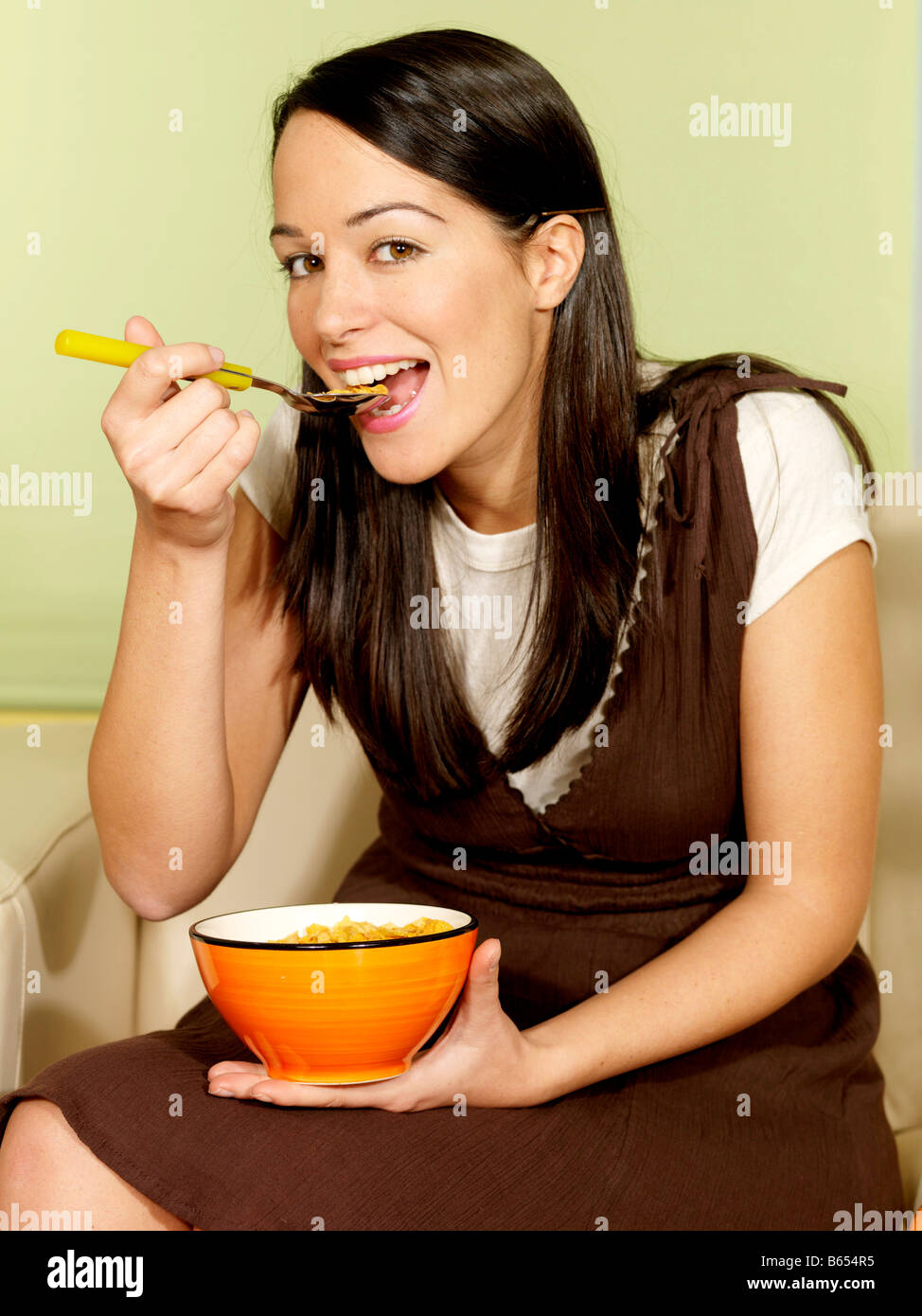 Young Woman Eating Breakfast Model Released Stock Photo - Alamy