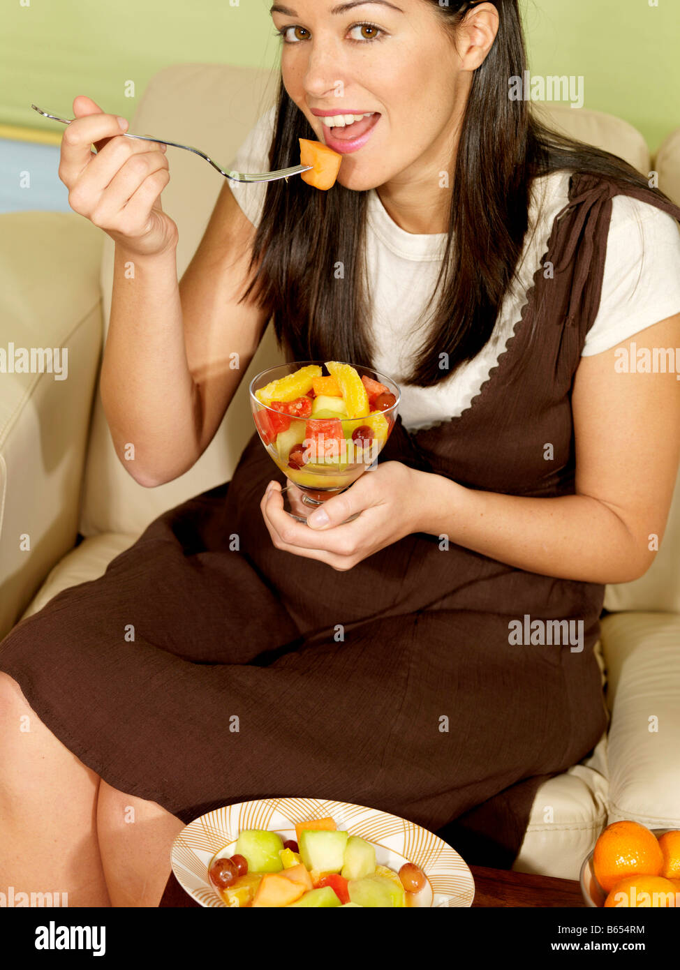 Young Woman Eating Fruit Salad Model Released Stock Photo - Alamy Young Woman Eating Fruit Salad Model Released Stock Photo - Alamy