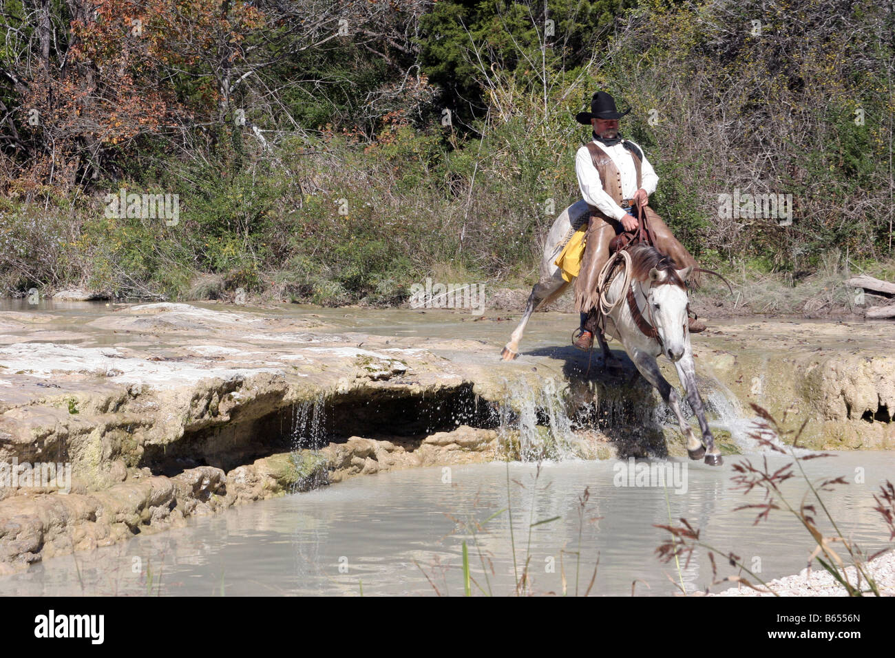 Cowboy crossing river hi-res stock photography and images - Alamy