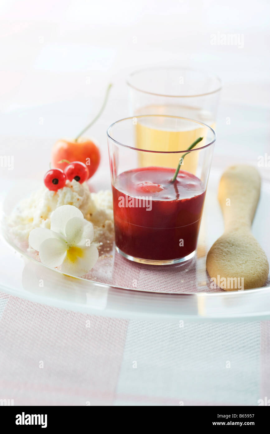 Gourmet snack tray including cocktails, cherries and spoon-shaped ...