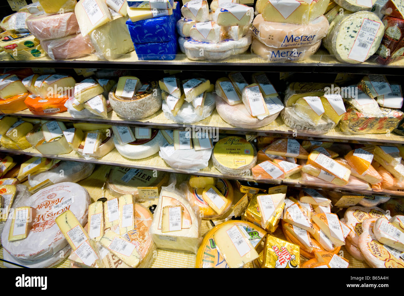 Cheese on display in French Supermarket Stock Photo - Alamy
