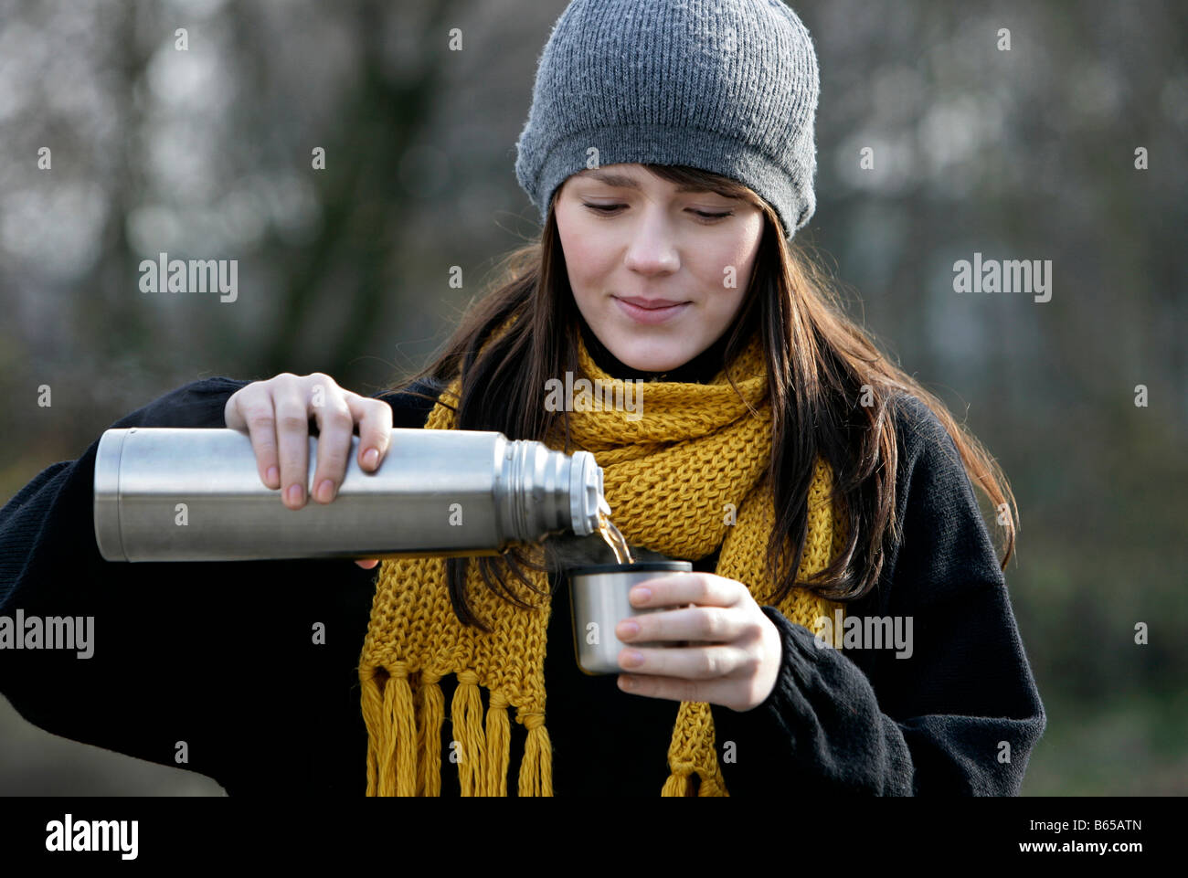 Young Girl drinking Tea Stock Photo - Alamy