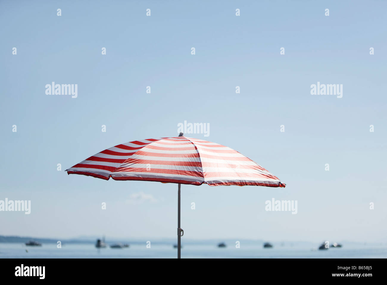 Red parasol parasols hi-res stock photography and images - Alamy