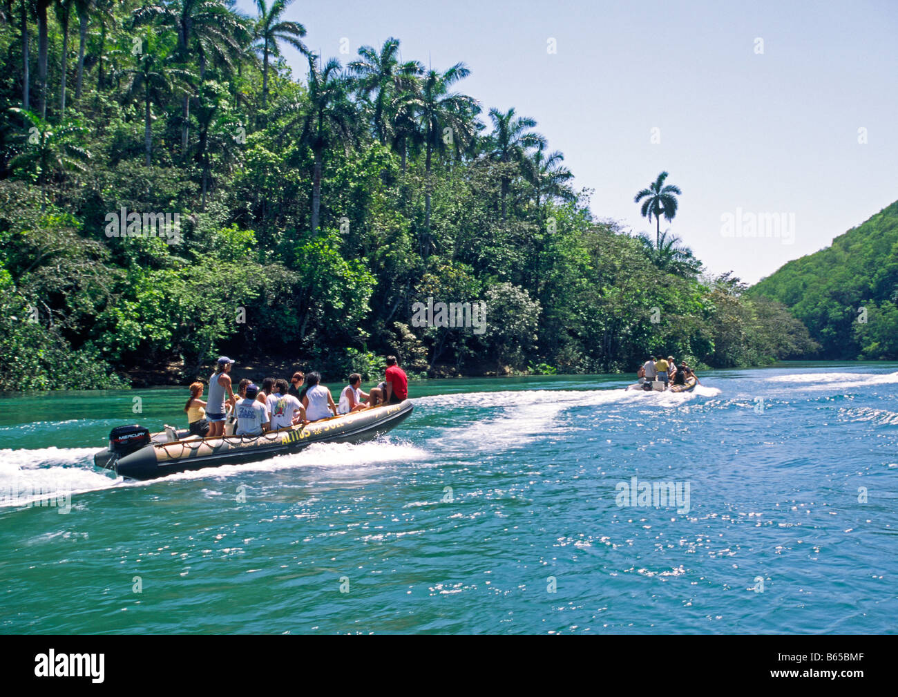 Tourists on the Rio Canimar River in Cuba in zodiac boats going down ...
