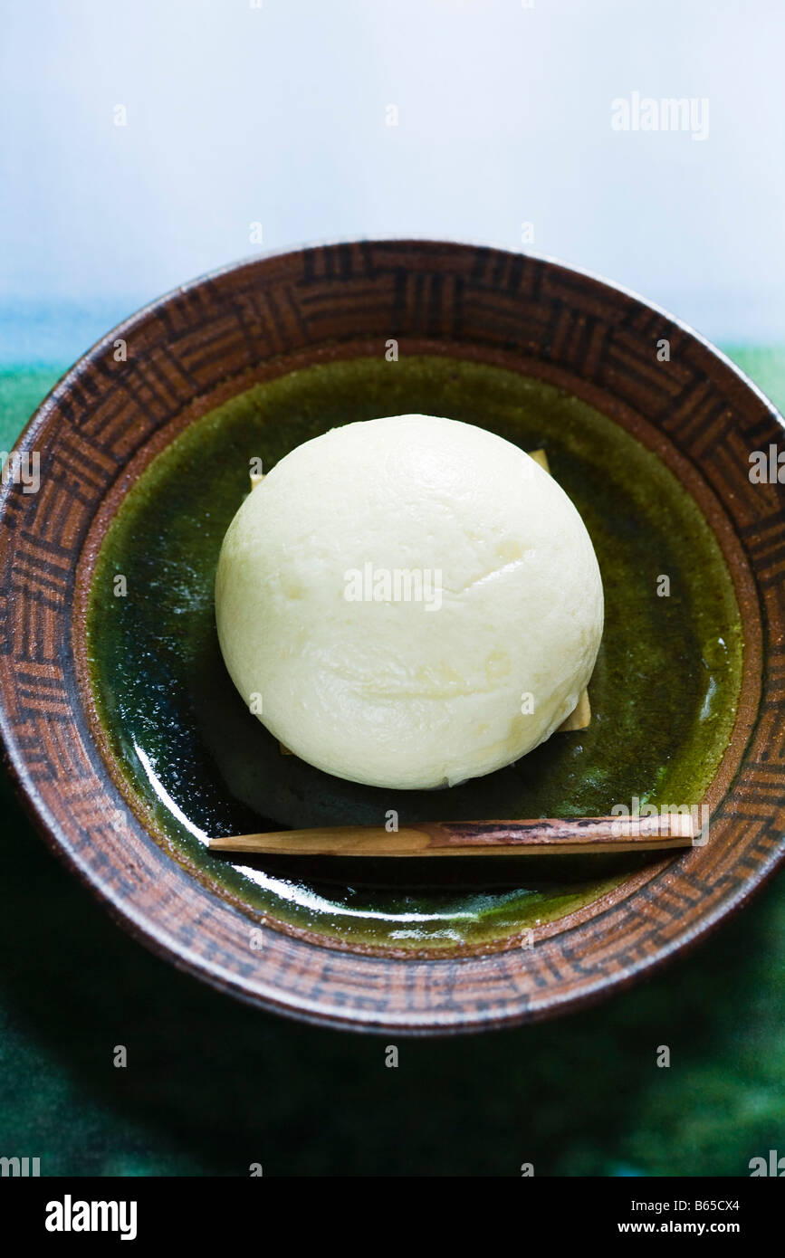 Manju (Japanese cake filled with bean paste) on plate, overhead view ...