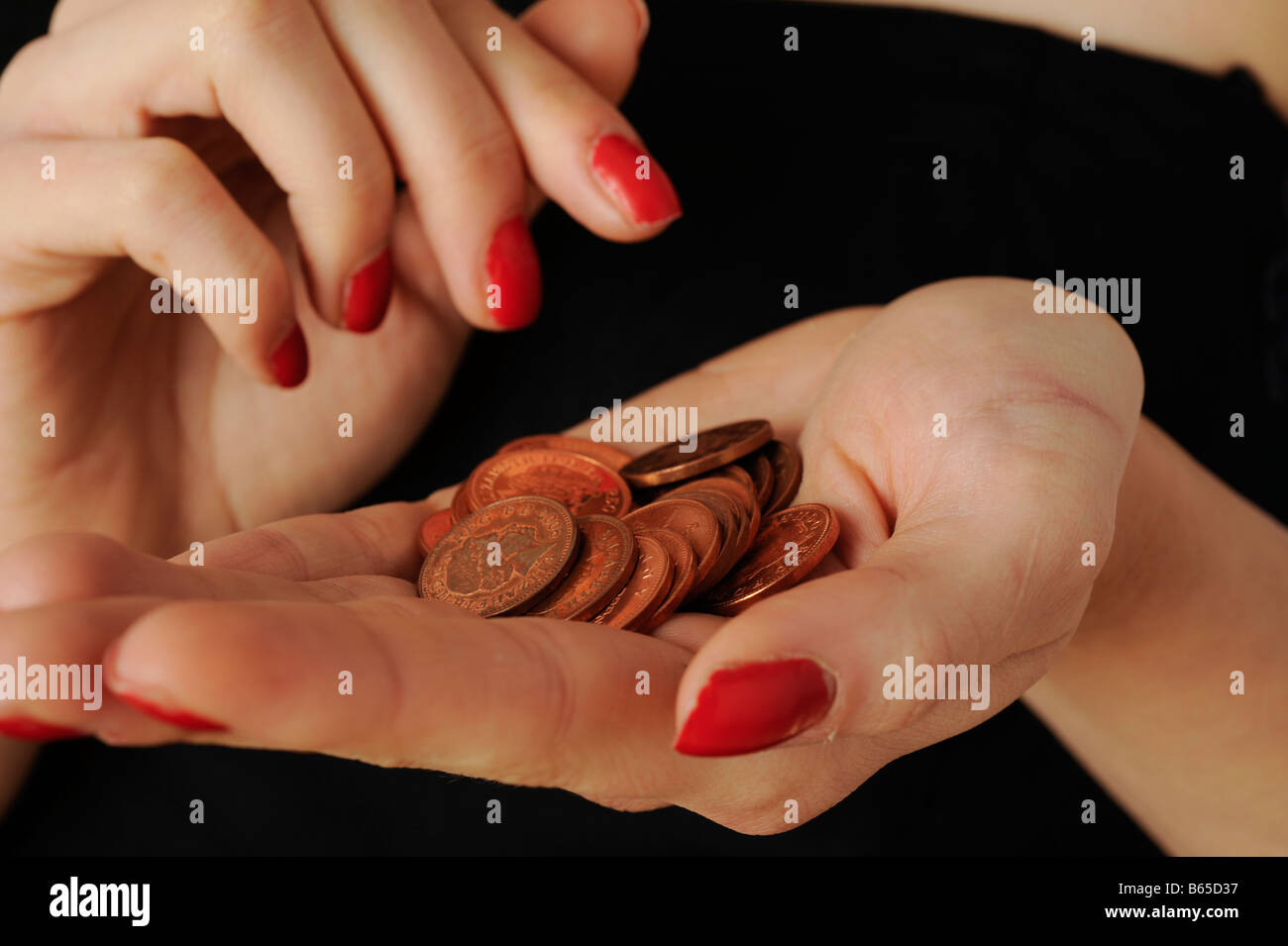 Woman's hand counting coins hi-res stock photography and images - Alamy