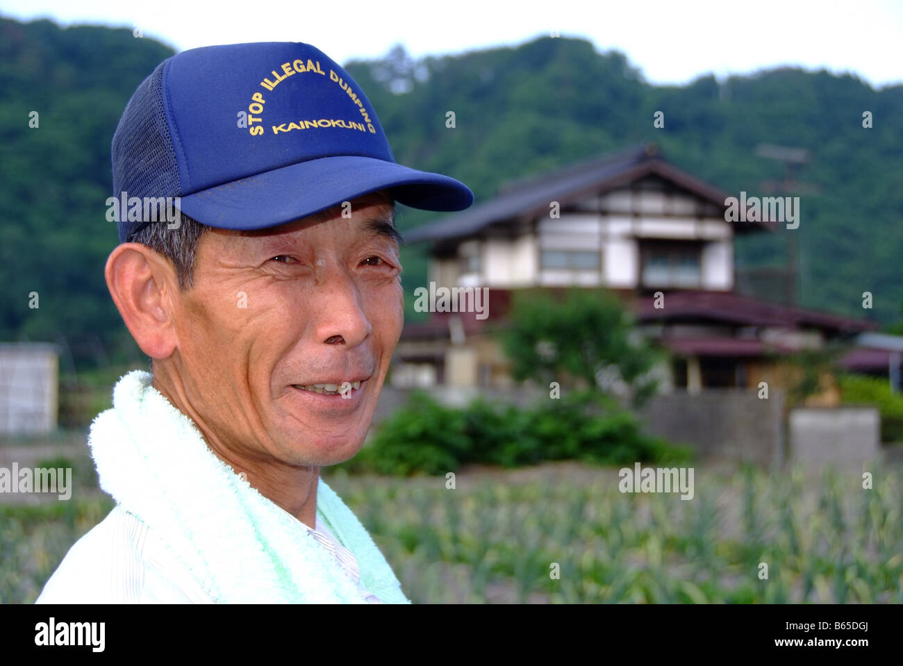 Portrait of a Japanese farmer in his paddy field Stock Photo - Alamy