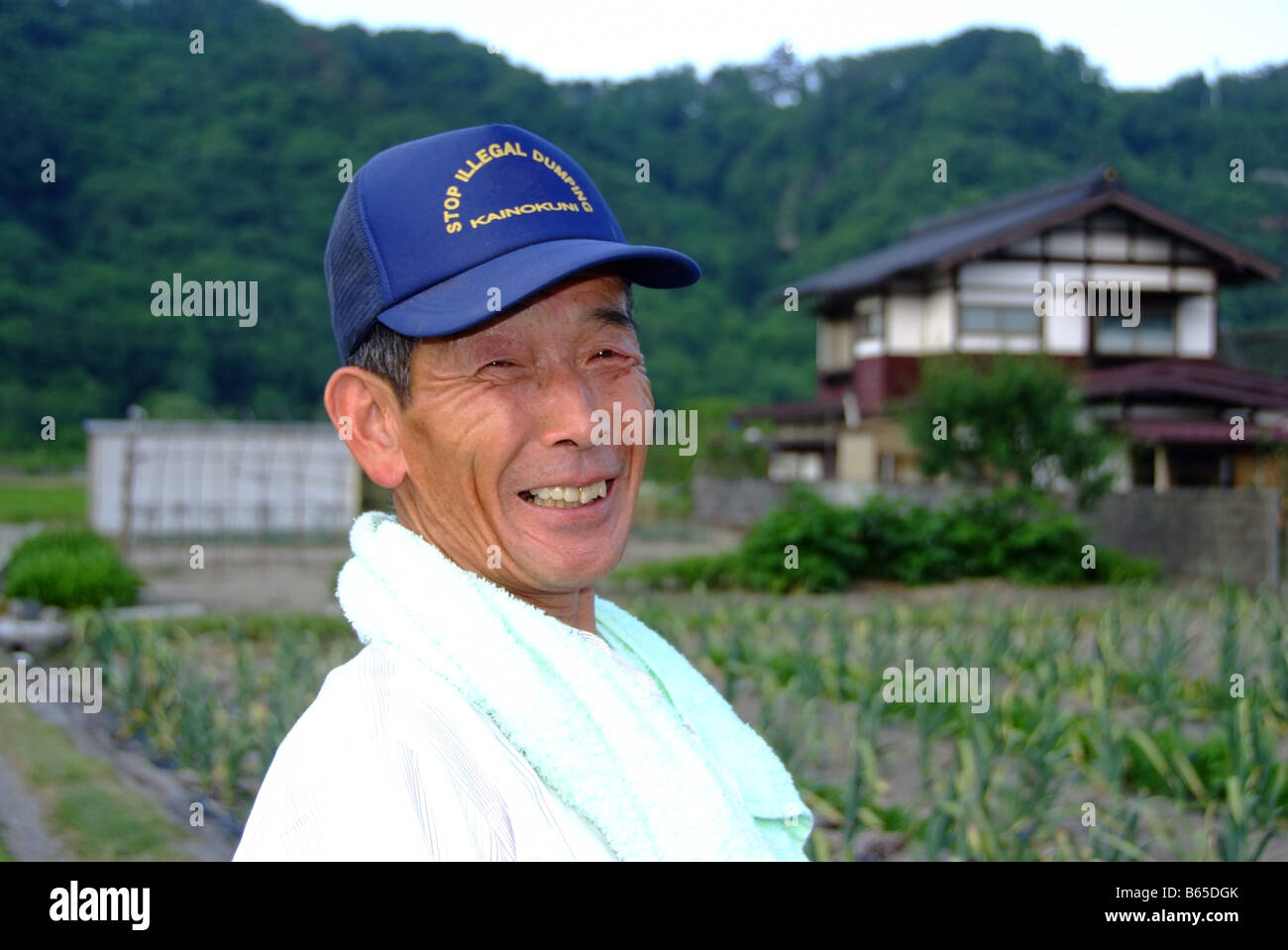 Portrait of a Japanese farmer in his paddy field Stock Photo - Alamy