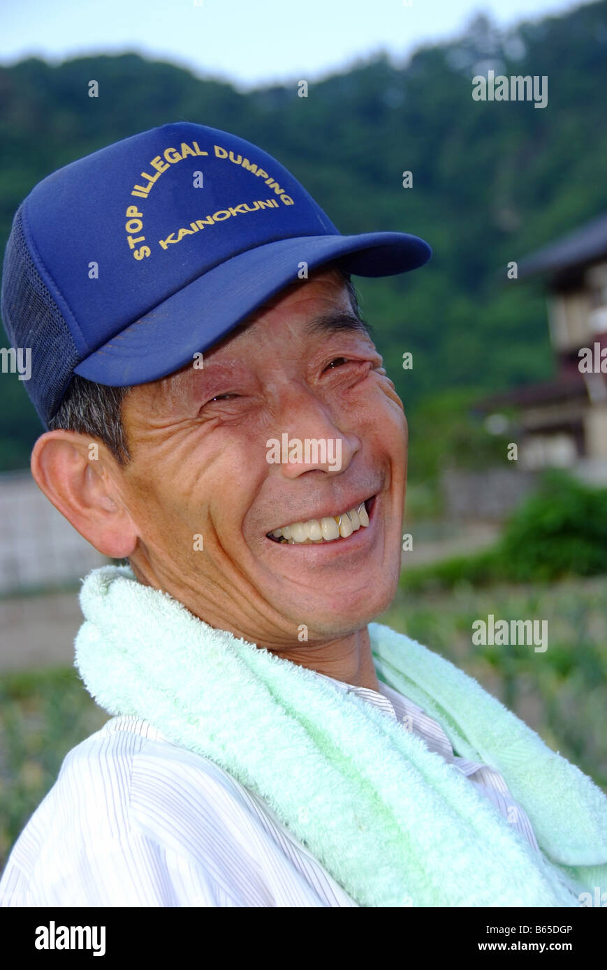 Portrait of a Japanese farmer in his paddy field Stock Photo - Alamy