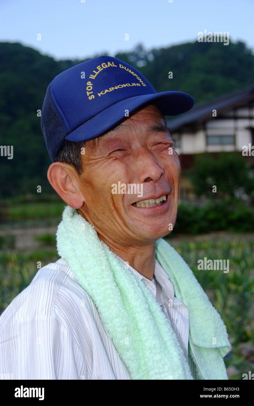 Portrait of a Japanese farmer in his paddy field Stock Photo - Alamy
