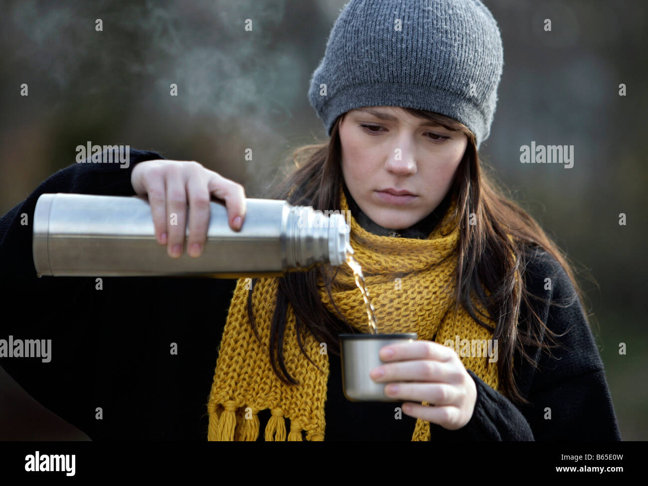 Young Girl drinking Tea Stock Photo - Alamy
