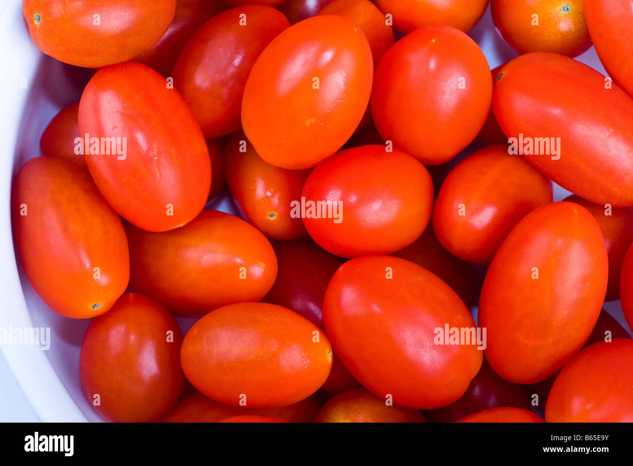 Tiny cherry tomatoes in hi-res stock photography and images - Alamy