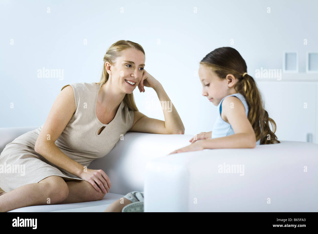 Two mothers talking children hi-res stock photography and images - Alamy