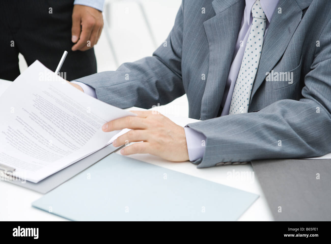 Reviewing contracts hi-res stock photography and images - Alamy