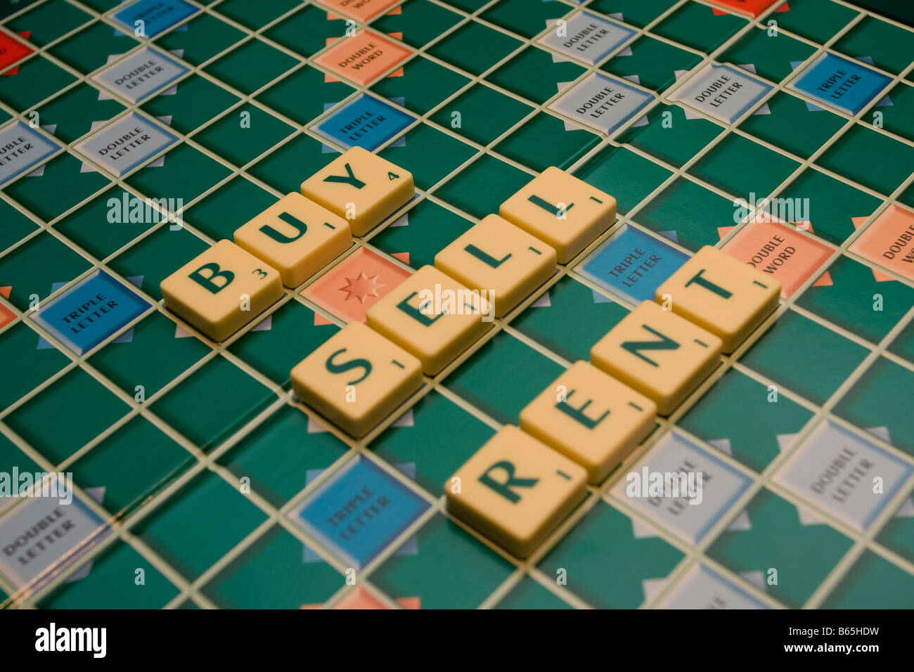 buy, sell, rent scrabble Stock Photo - Alamy
