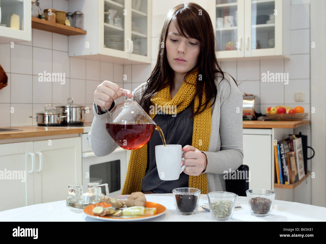 Young Girl drinking Tea Stock Photo - Alamy