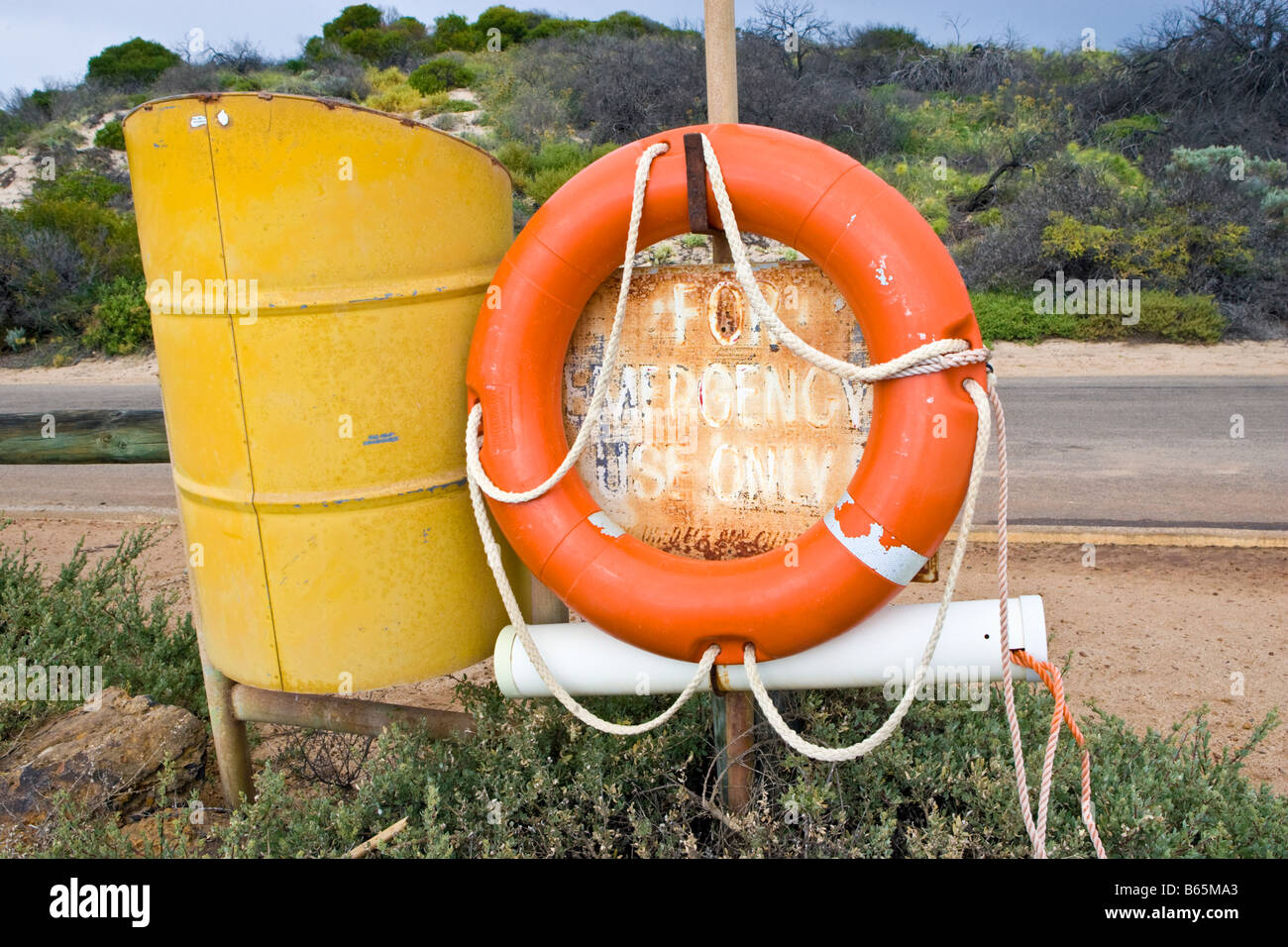 A lifebuoy on a sign stating "For Emergency Use Only Stock Photo - Alamy