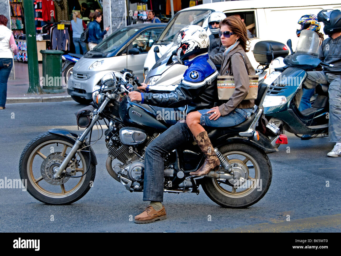 woman man on a motorbike Athens Greece Greek Stock Photo - Alamy