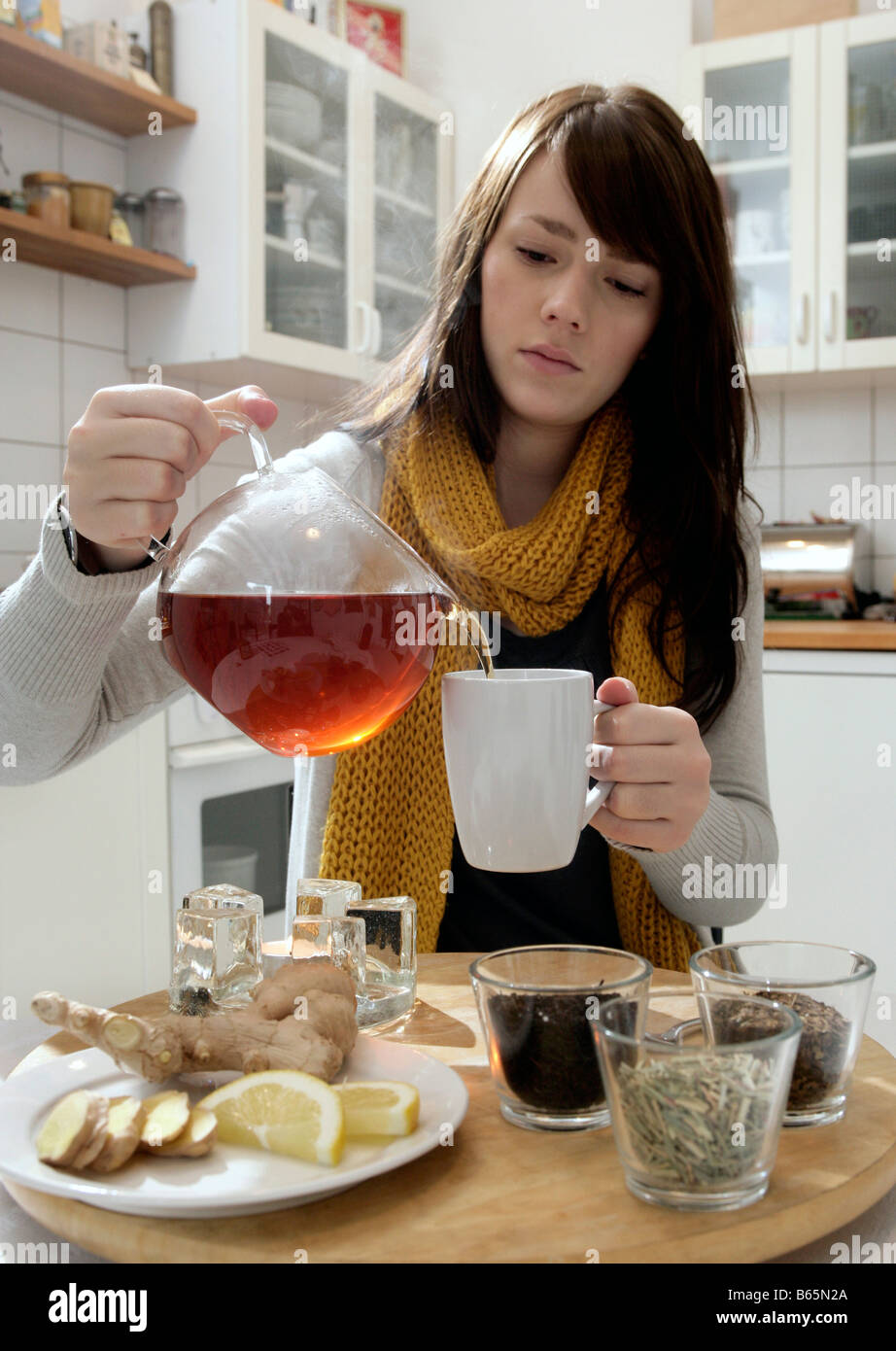 Young Girl drinking Tea Stock Photo - Alamy