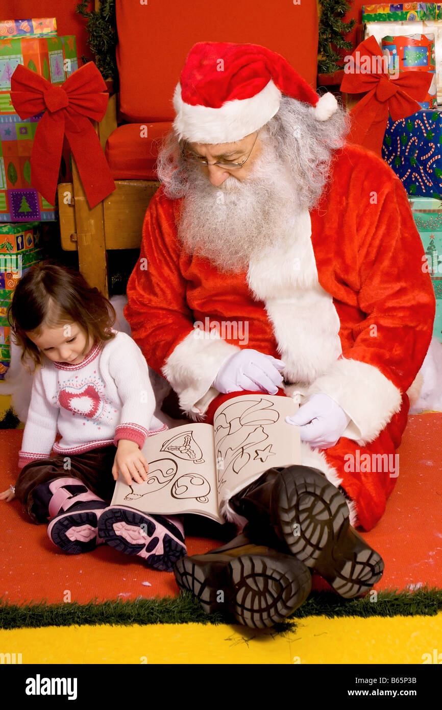 Santa claus sitting on a chair hi-res stock photography and images - Alamy