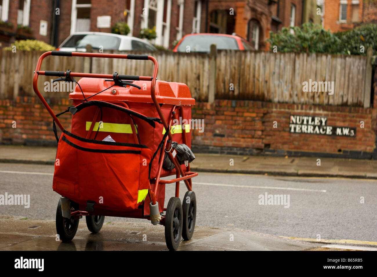 Royal mail service on a pavement, London, England, UK Stock Photo - Alamy
