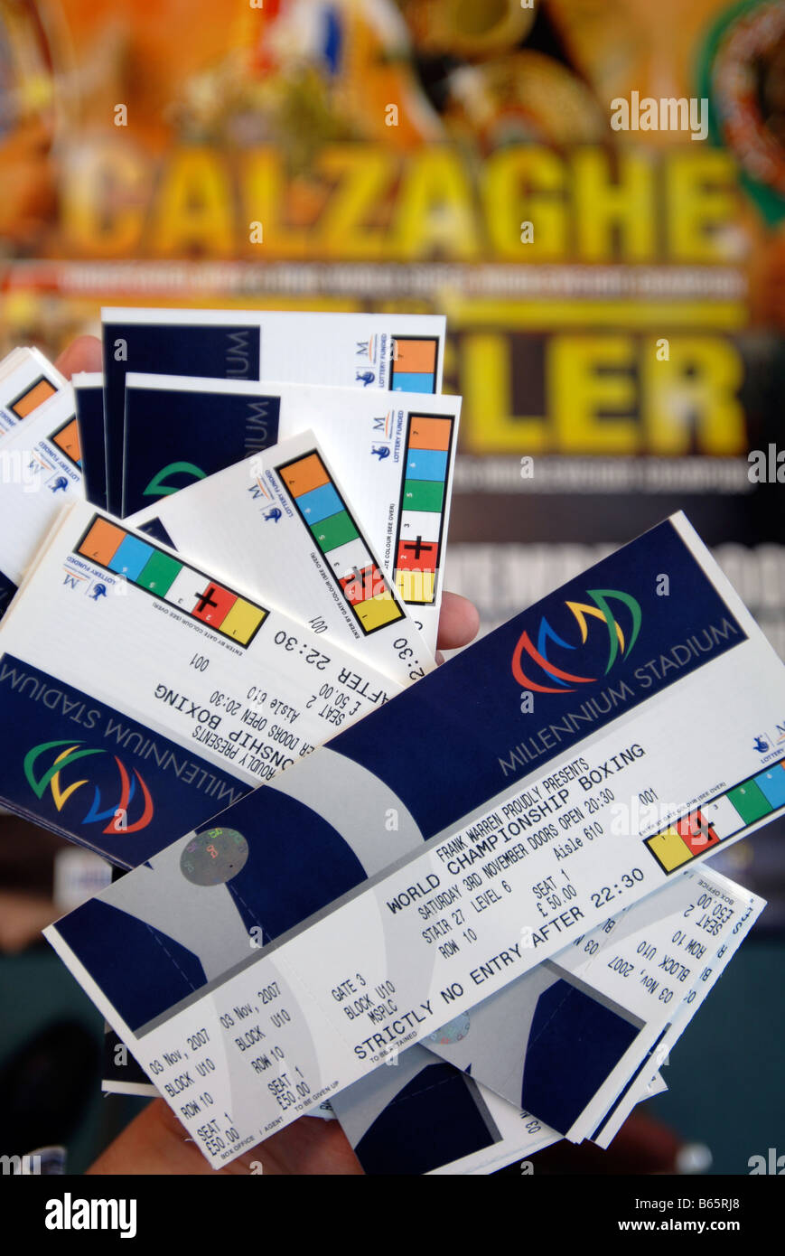 A BOXING FAN HOLDS TICKETS FOR THE FIGHT BETWEEN JOE CALZAGHE AND MIKEL ...