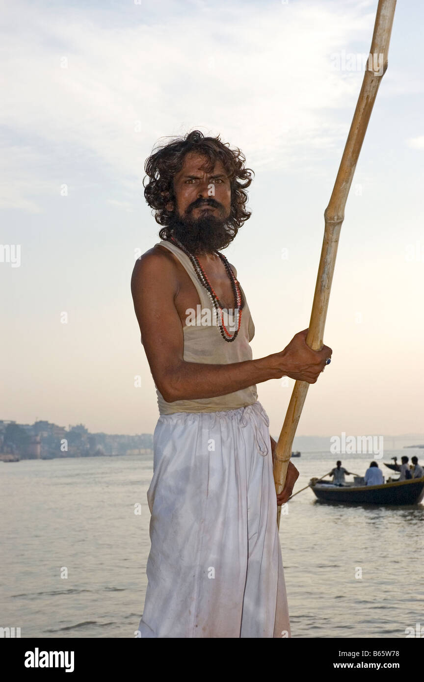 A boatman at the ghats in the Ganges River in Varanasi India Stock ...