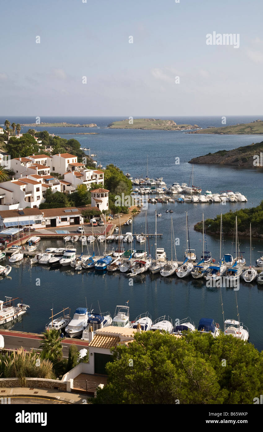 The harbour and village of Port d'Addaia, Menorca, Spain Stock Photo ...
