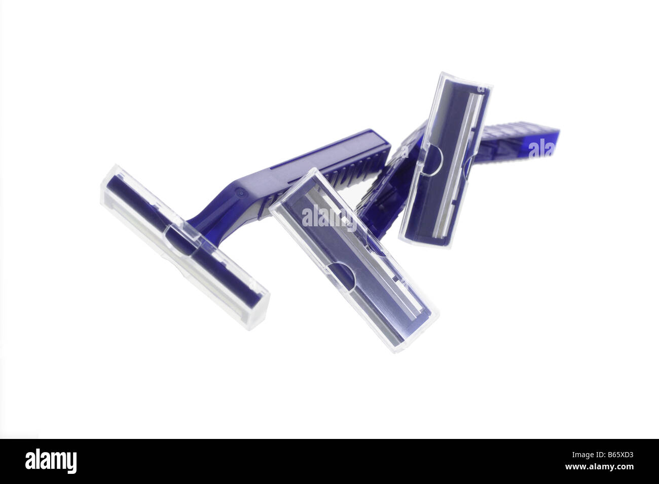 Three disposal razor blades on white background Stock Photo - Alamy