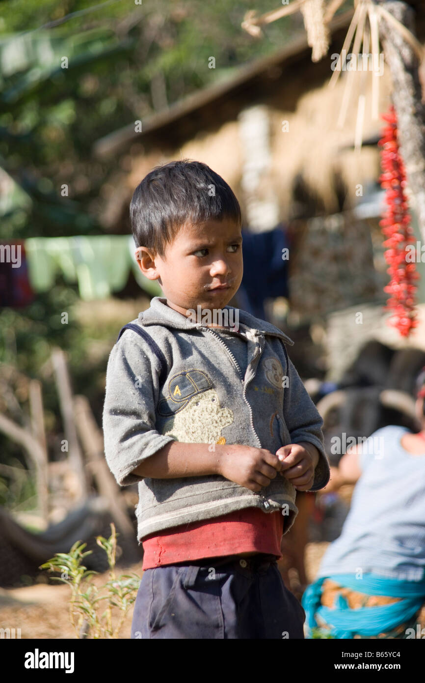 Farmhouse and a boy on the side of the Modi River valley in the ...