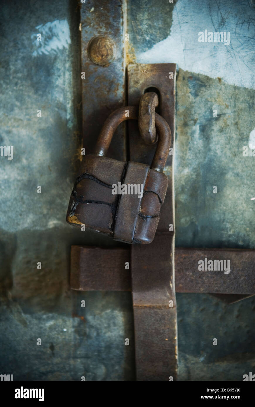 Rusty robust metal lock Stock Photo - Alamy