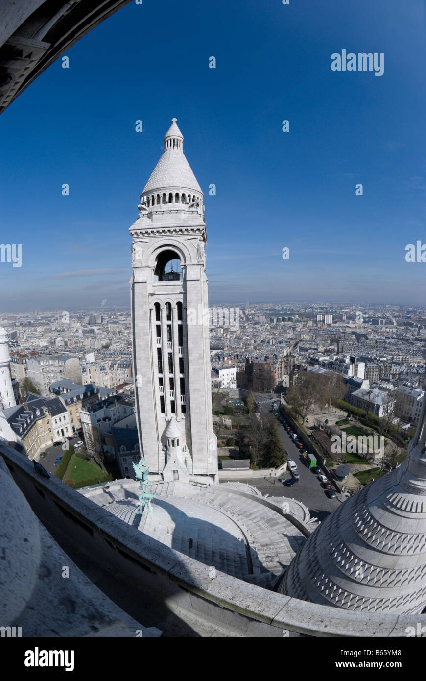 Fish-eye view of the bell tower of Sacre Coeur and the Paris skyline as ...