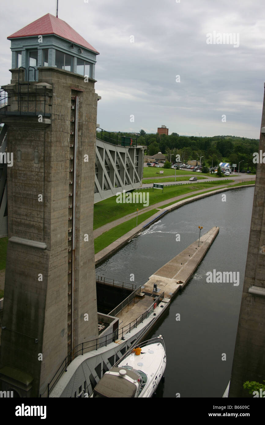 A boat prepares to leave the lower end of the Peterborough lift-locks ...