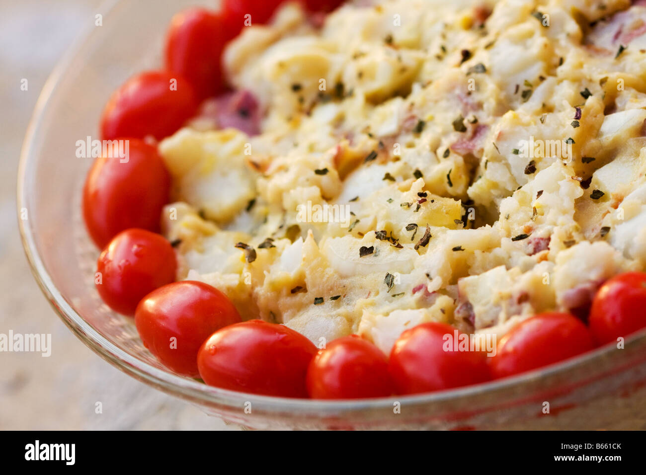 Homemade potato salad with grape tomatoes Stock Photo - Alamy