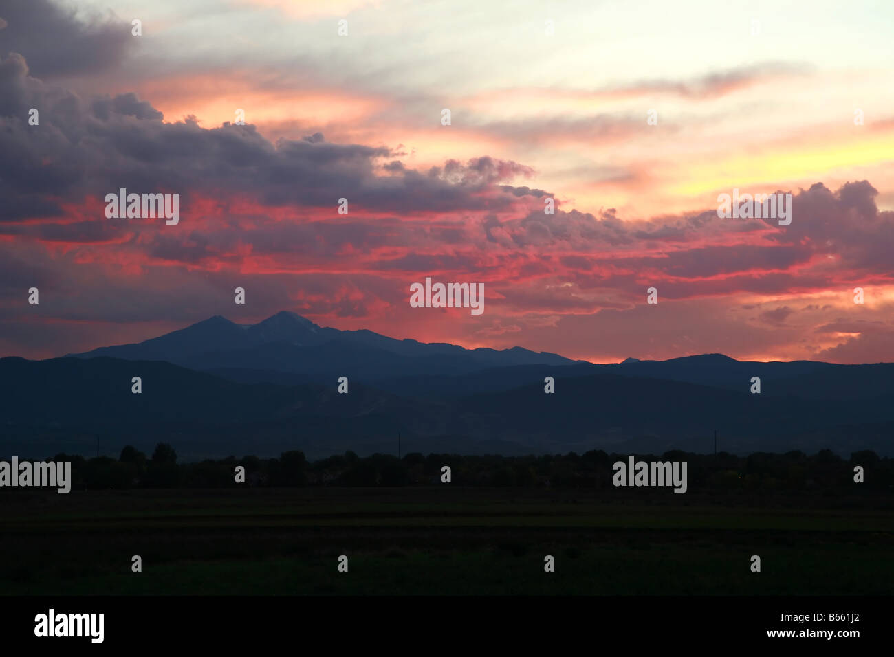 A colorful sunset over the rocky mountains Stock Photo - Alamy