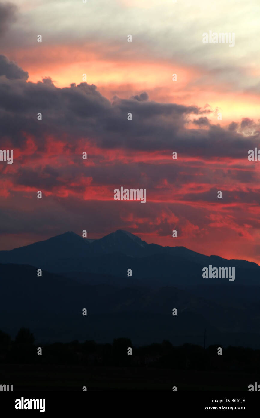 A colorful sunset over the rocky mountains Stock Photo - Alamy